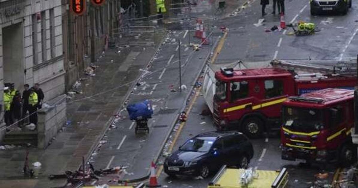 One child trapped under car that drove into crowd at Liverpool victory ...