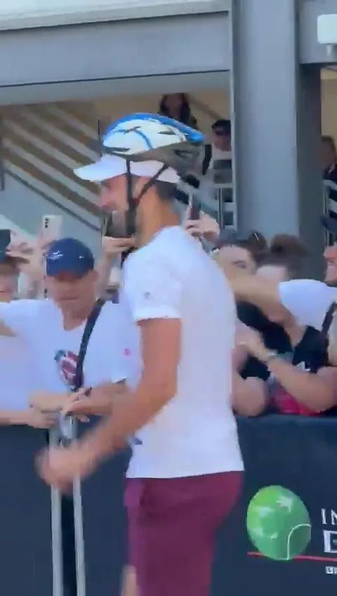 Watch Djokovic hilarious moment wearing helmet after being hit on the ...