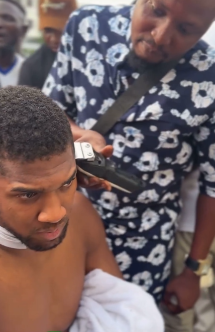 Anthony Joshua gets street-side Haircut in Nigeria: Boasts about ...