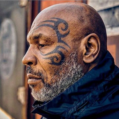 Mike Tyson’s face tattoo EXPLAINED: What does it mean and why did he ...
