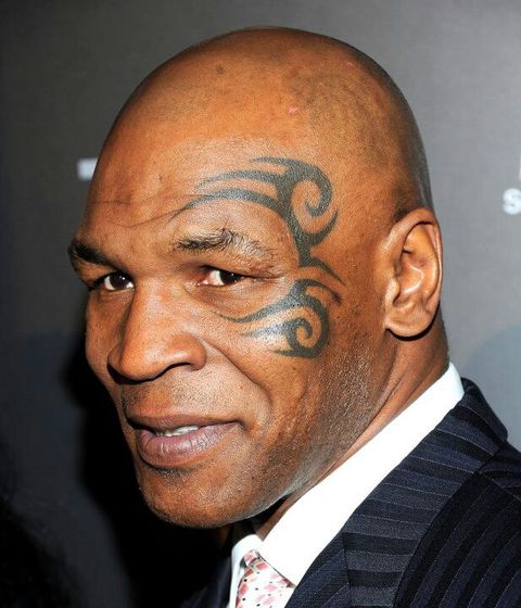 Mike Tyson’s face tattoo EXPLAINED: What does it mean and why did he ...